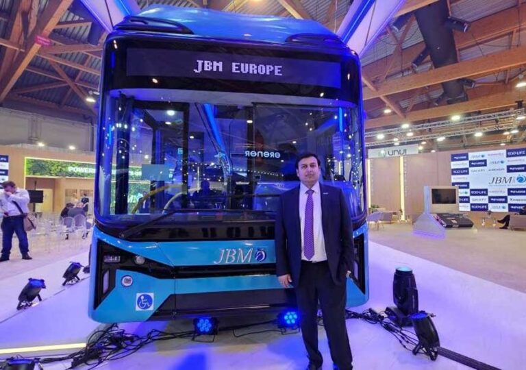 JBM Electric Vehicles unveils ECOLIFE e12 at Busworld 2025 | Autoguideindia